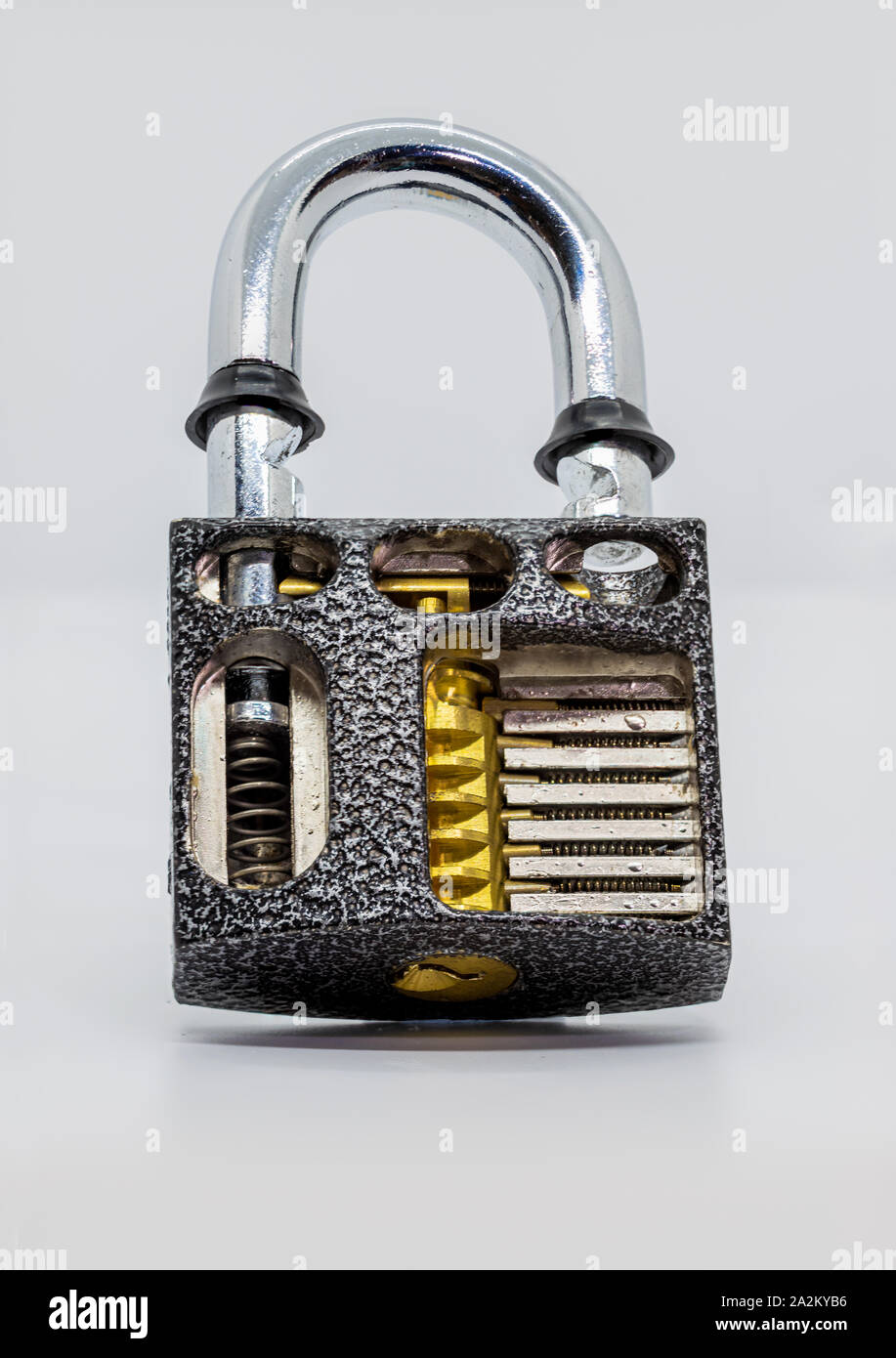 Open padlock with machined cutouts showing internal workings Stock ...