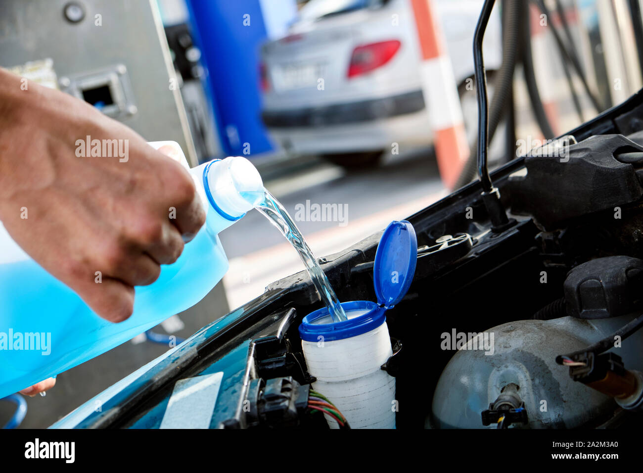 Filling windshield washer fluid hi-res stock photography and images - Alamy