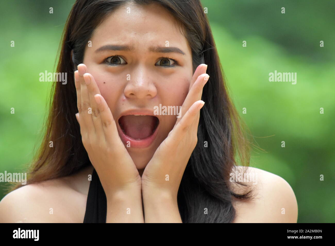 A Shocked Female Woman Stock Photo - Alamy