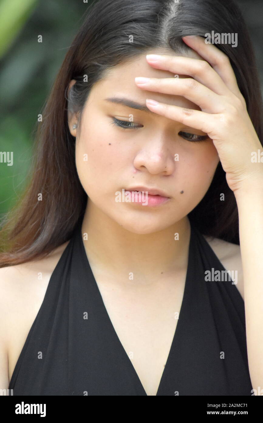 A Worrisome Adult Female Stock Photo - Alamy