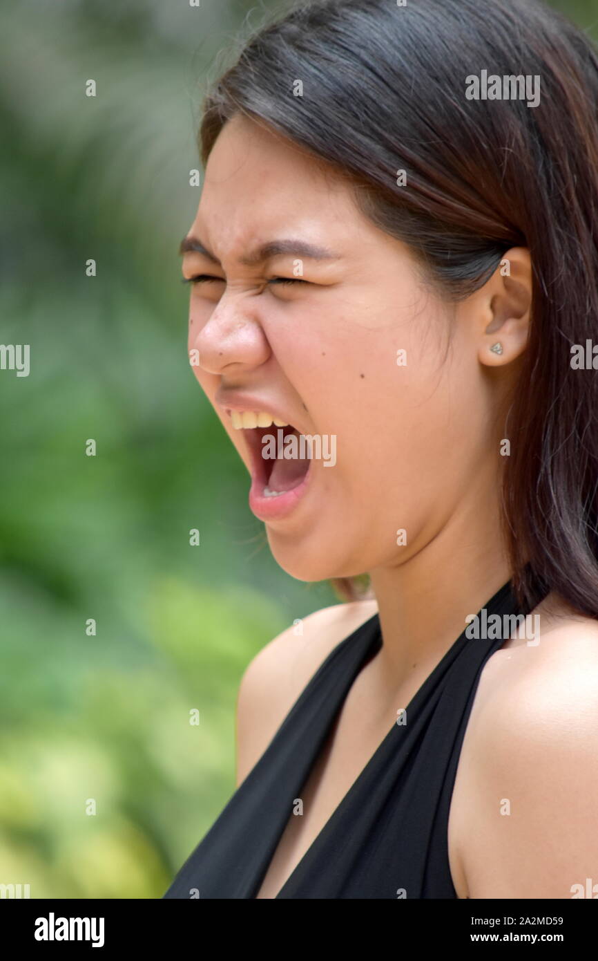 A Young Diverse Female Shouting Stock Photo - Alamy