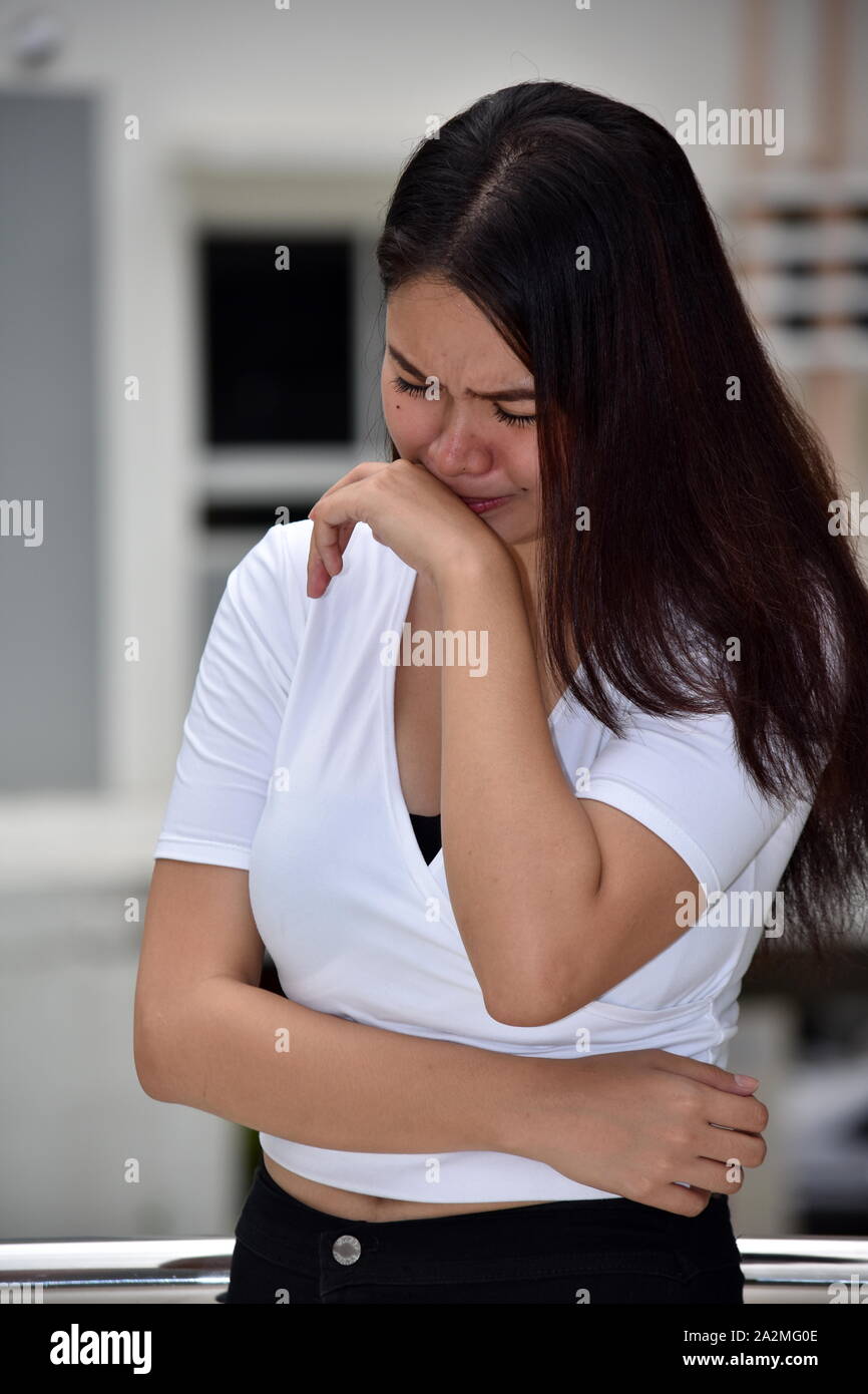 A Crying Diverse Female Stock Photo - Alamy