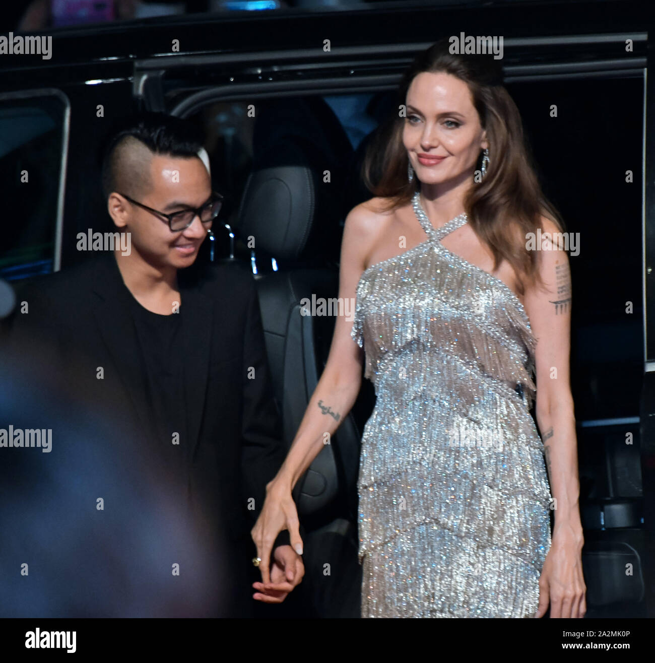 Maddox jolie pitt and angelina jolie hi-res stock photography and ...