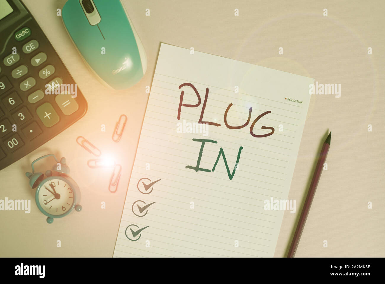 Writing note showing Plug In. Business concept for putting device into ...