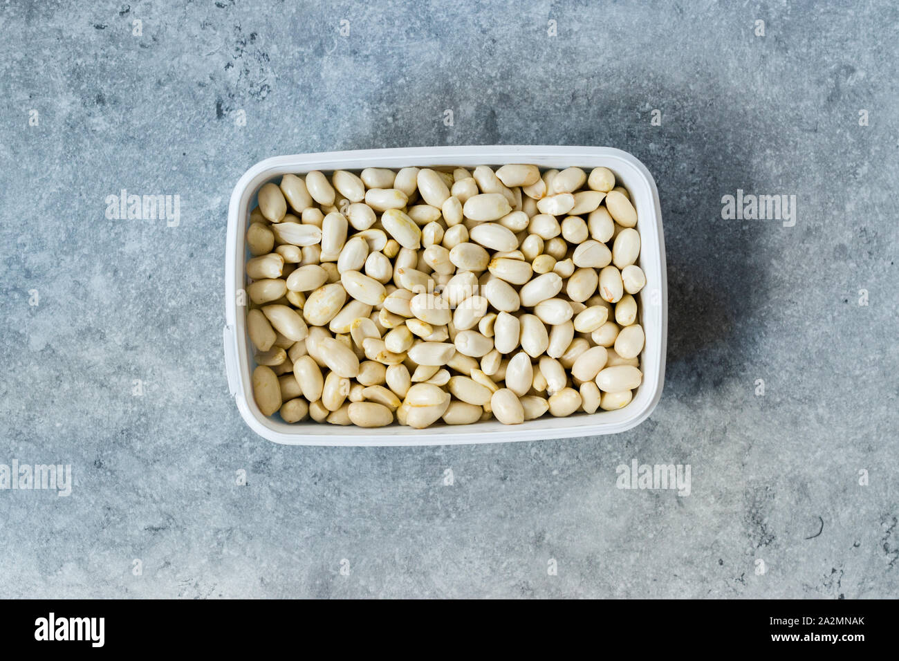 Organic Unsalted White Peeled Raw Peanuts in Plastic Box Container ...