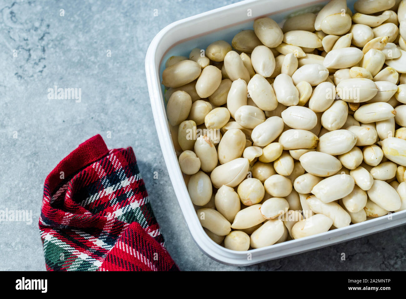 Organic Unsalted White Peeled Raw Peanuts in Plastic Box Container ...