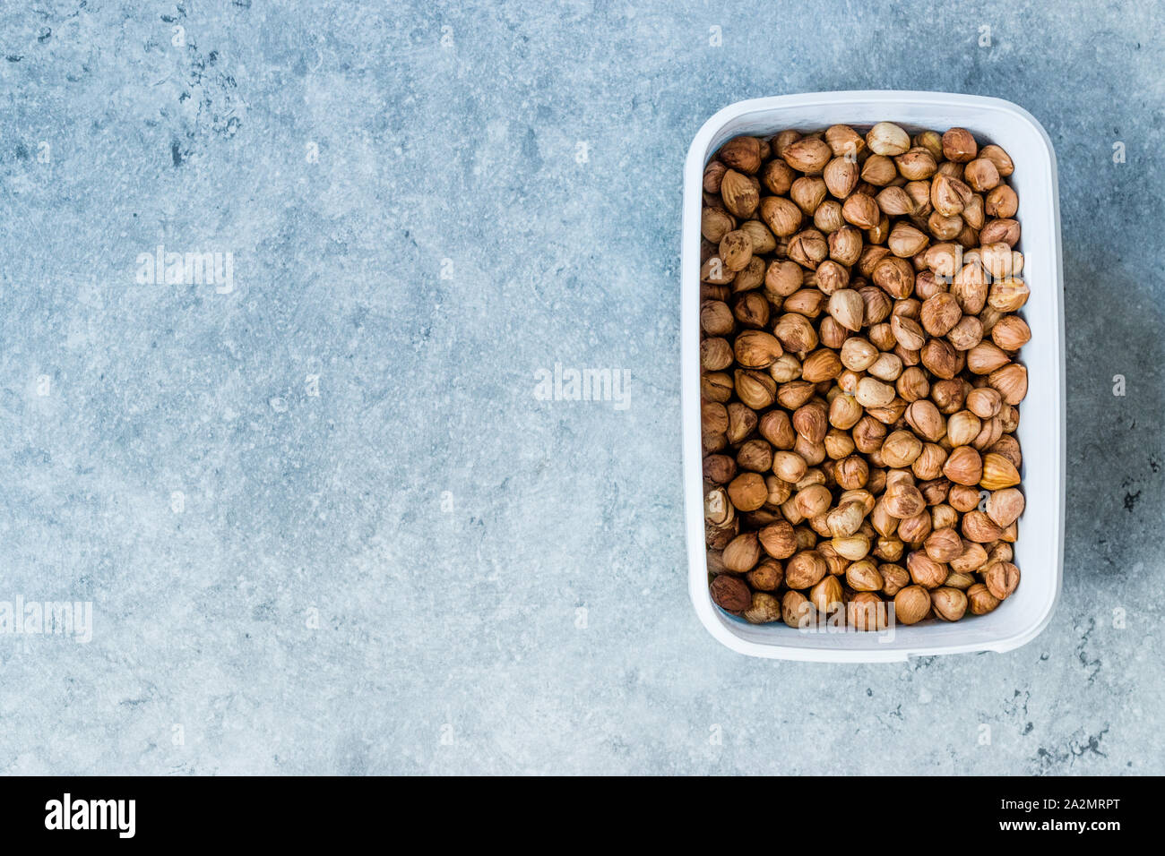 Roasted Macadamia Nuts in Plastic Box Container / Package. Organic Food ...