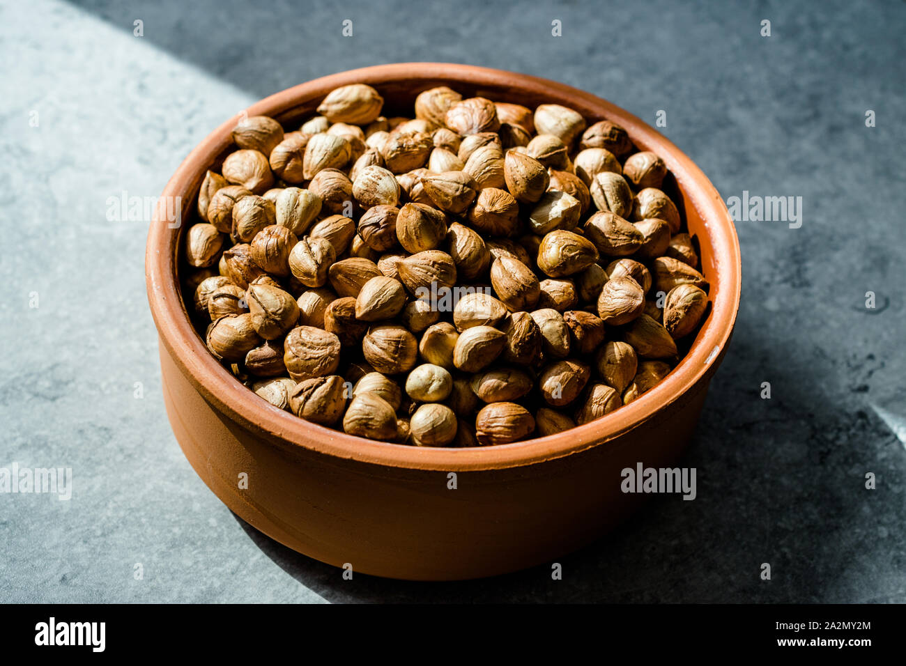 Roasted Macadamia Nuts in Stew Pot. Organic Food Stock Photo - Alamy
