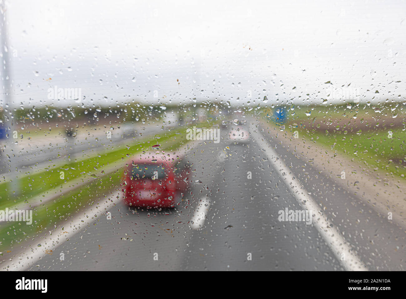 Rain drop on the car glass background Stock Photo - Alamy