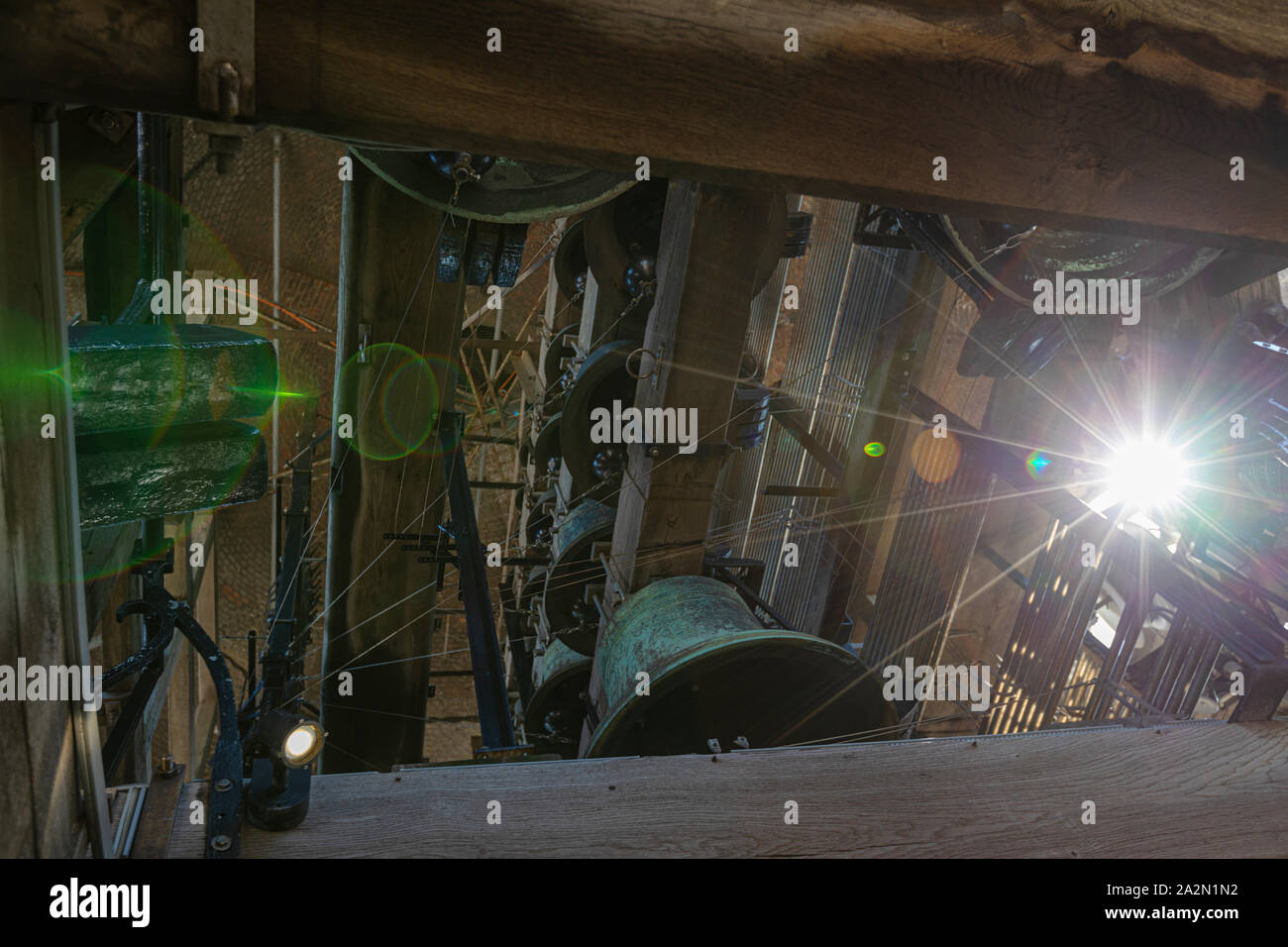The metal bell inside the bell tower Stock Photo - Alamy