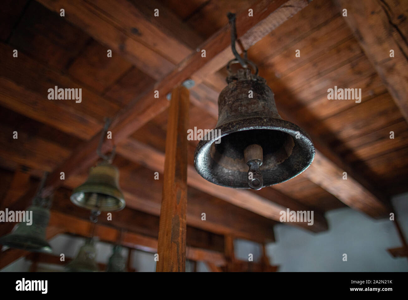 The metal bell inside the bell tower Stock Photo - Alamy