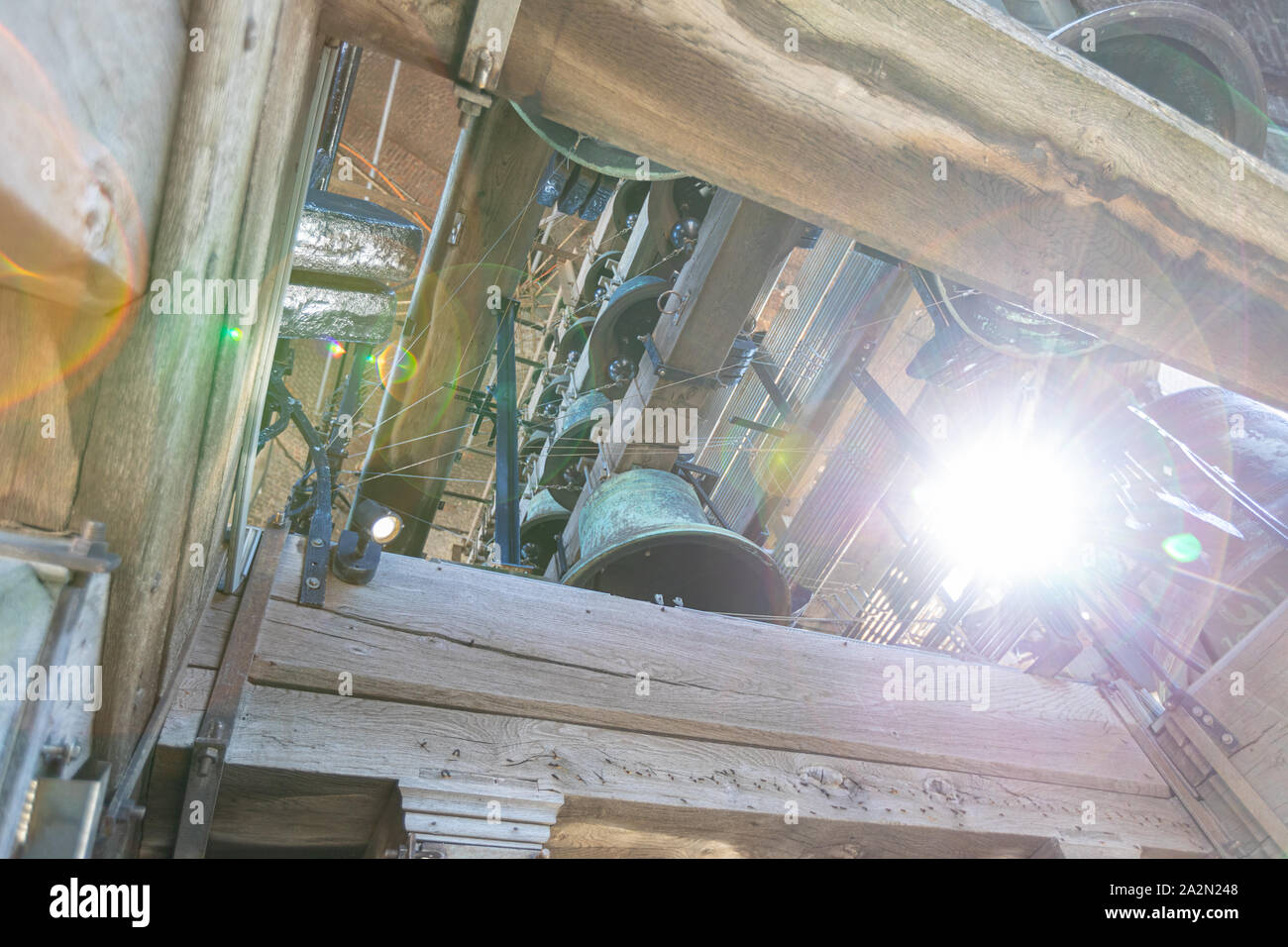 The metal bell inside the bell tower Stock Photo - Alamy