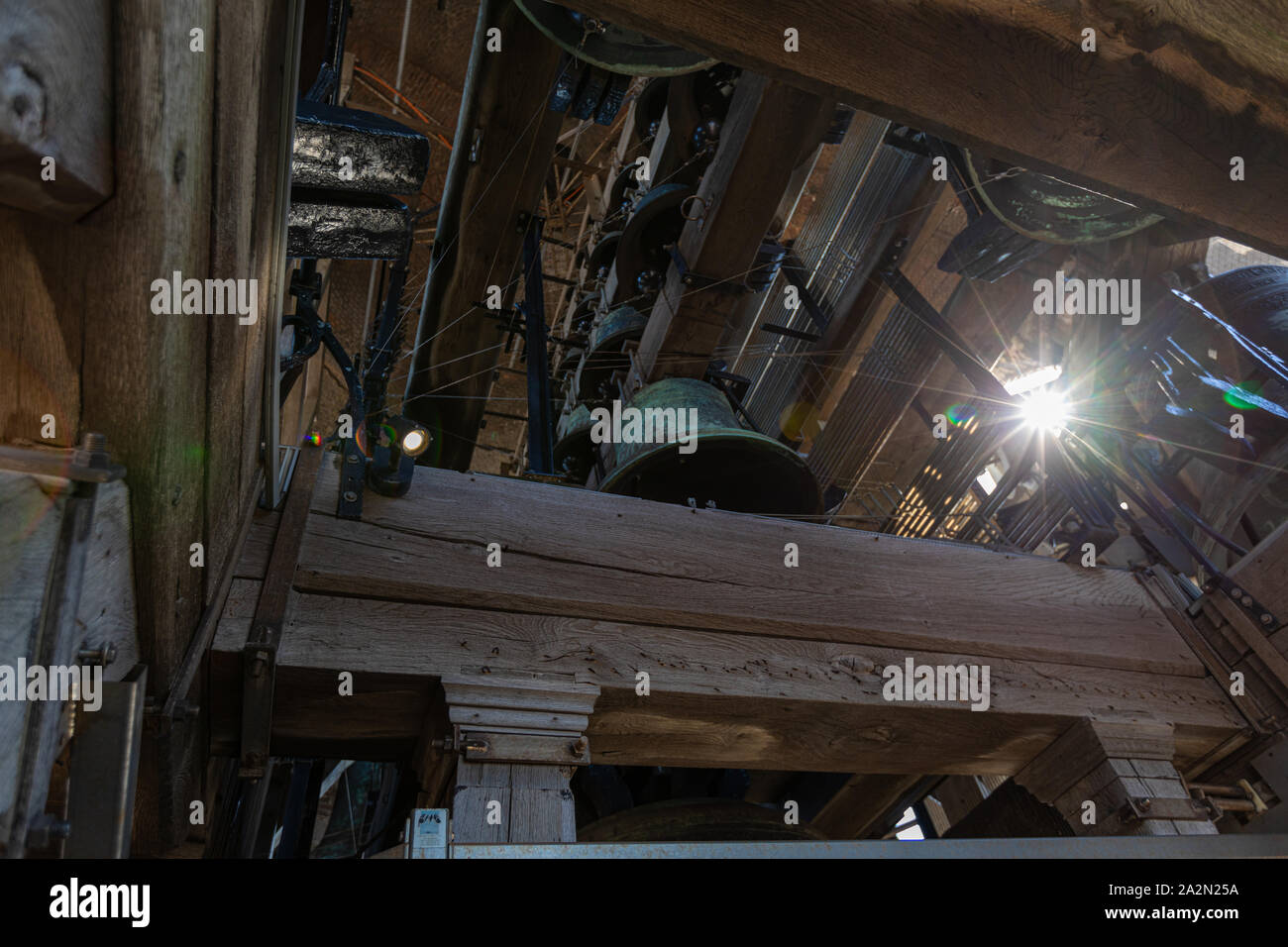 The metal bell inside the bell tower Stock Photo - Alamy