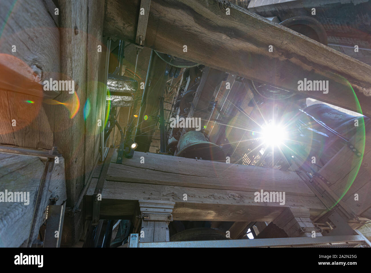 The metal bell inside the bell tower Stock Photo - Alamy