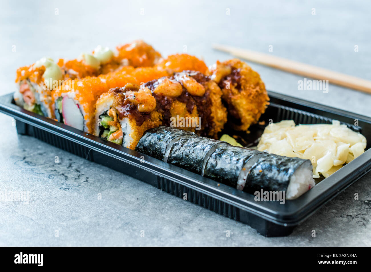 Sushi Set in Plastic Container Box / Package. California Roll, New York ...