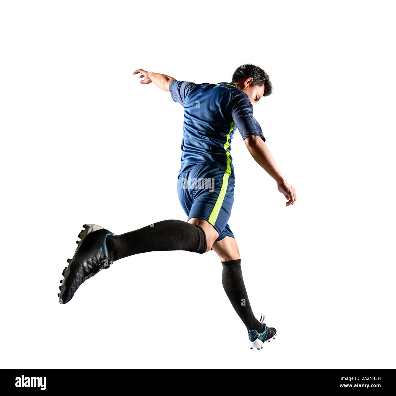 one soccer player man isolated on white background Stock Photo - Alamy