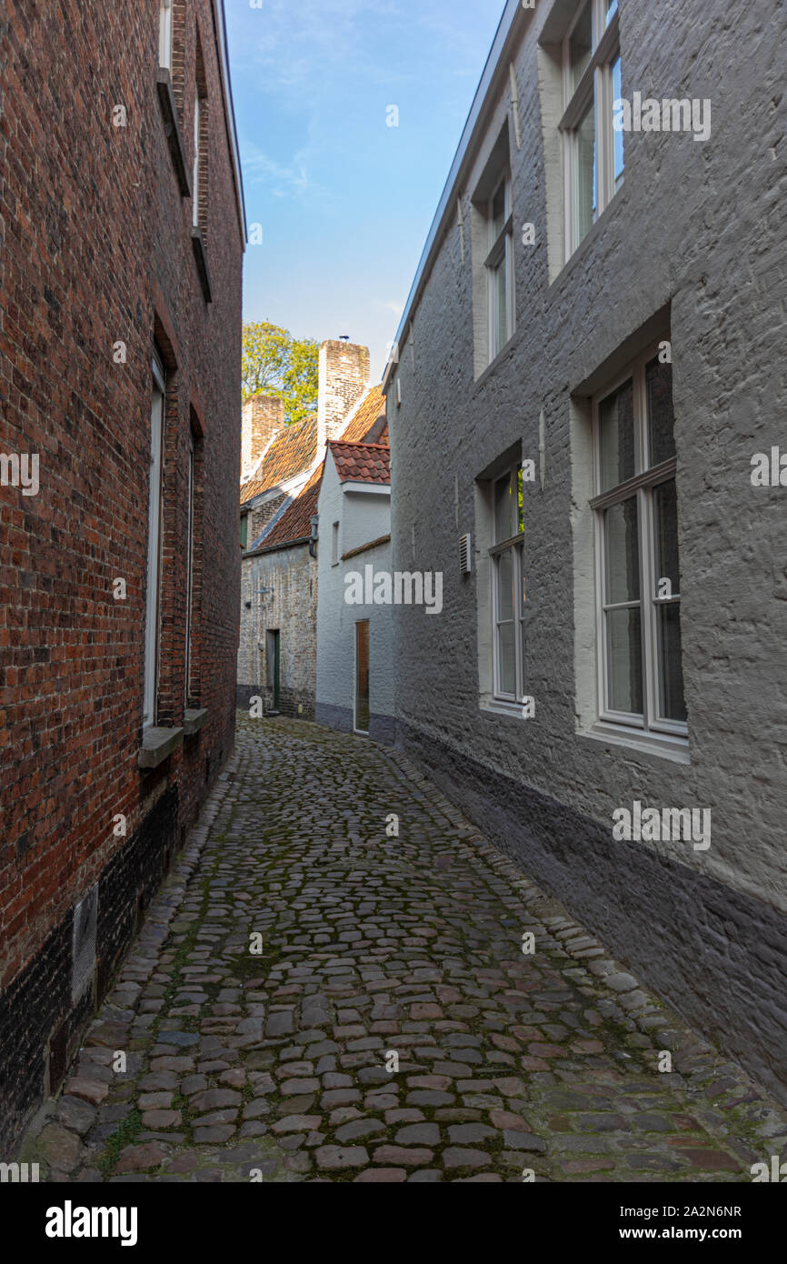 Narrow street between houses old town in Belgium Stock Photo - Alamy
