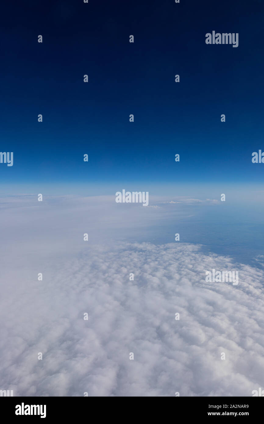 High altitude view between sky and space from plane Stock Photo - Alamy
