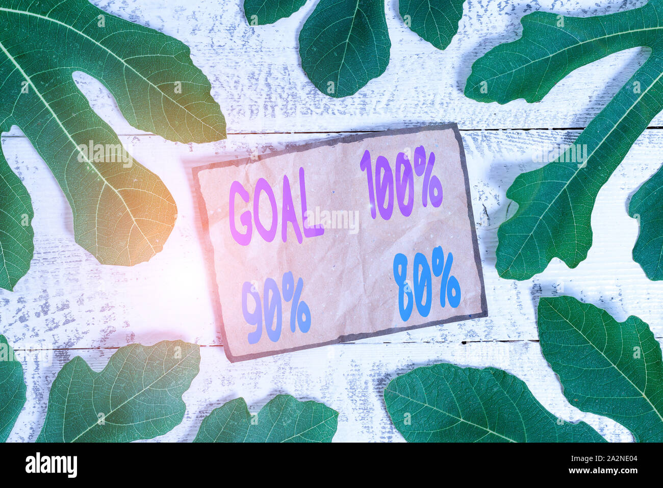 Writing note showing Goal 100 Percent 90 Percent 80 Percent. Business ...