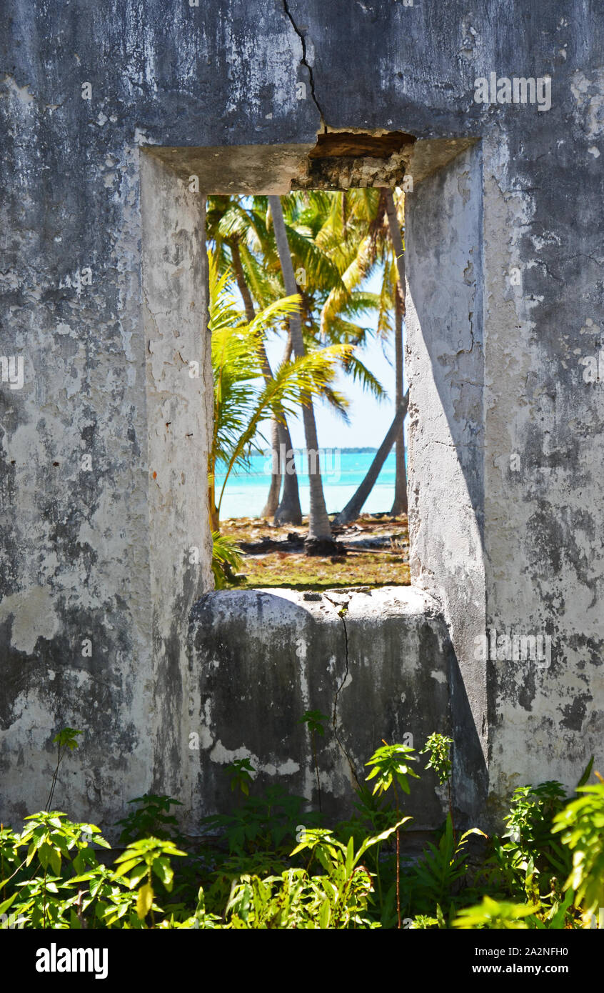 View of the lagoon through the window of an abandoned building in the ...
