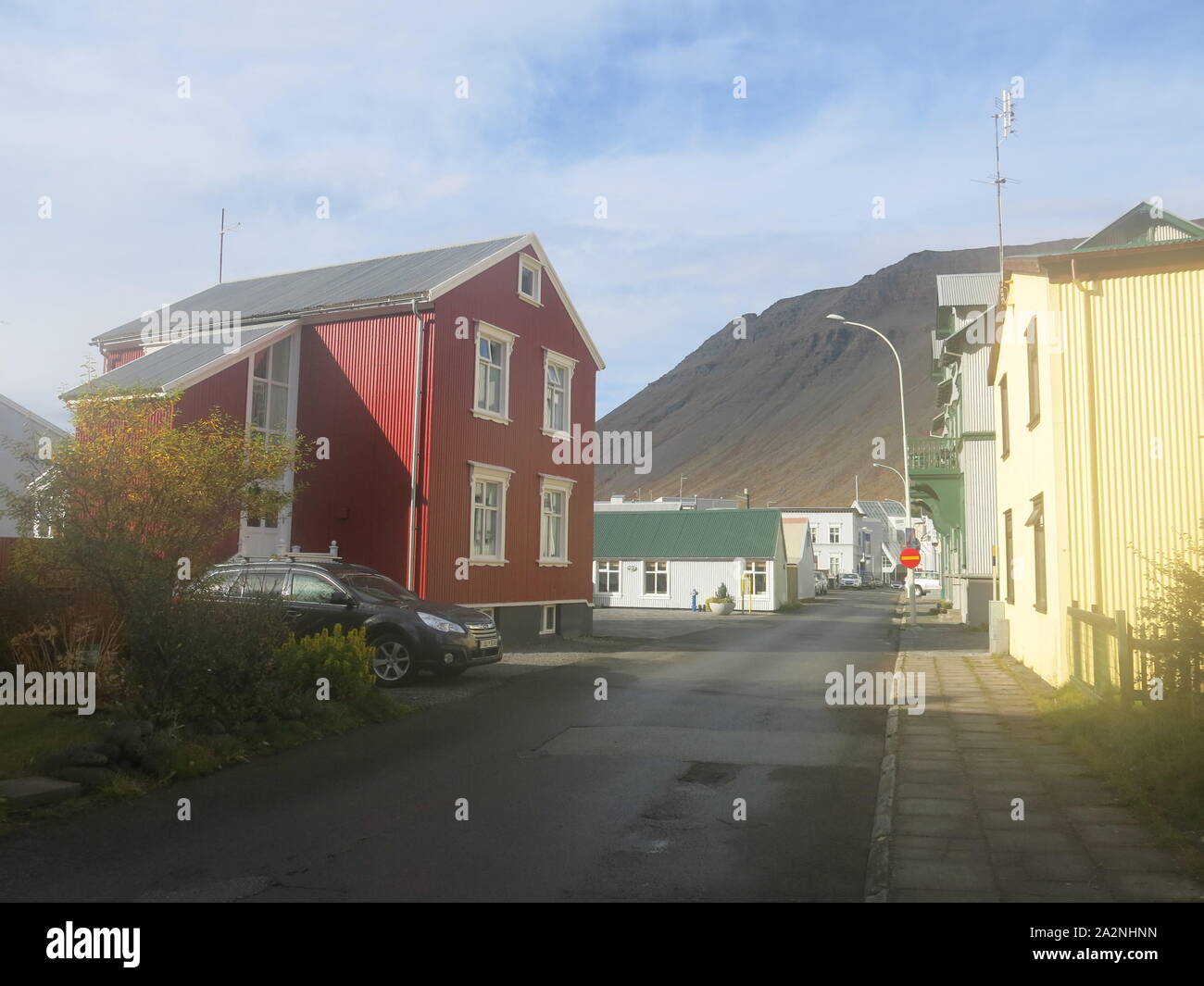 The small town of Isafjordur has brightly coloured buildings in ...