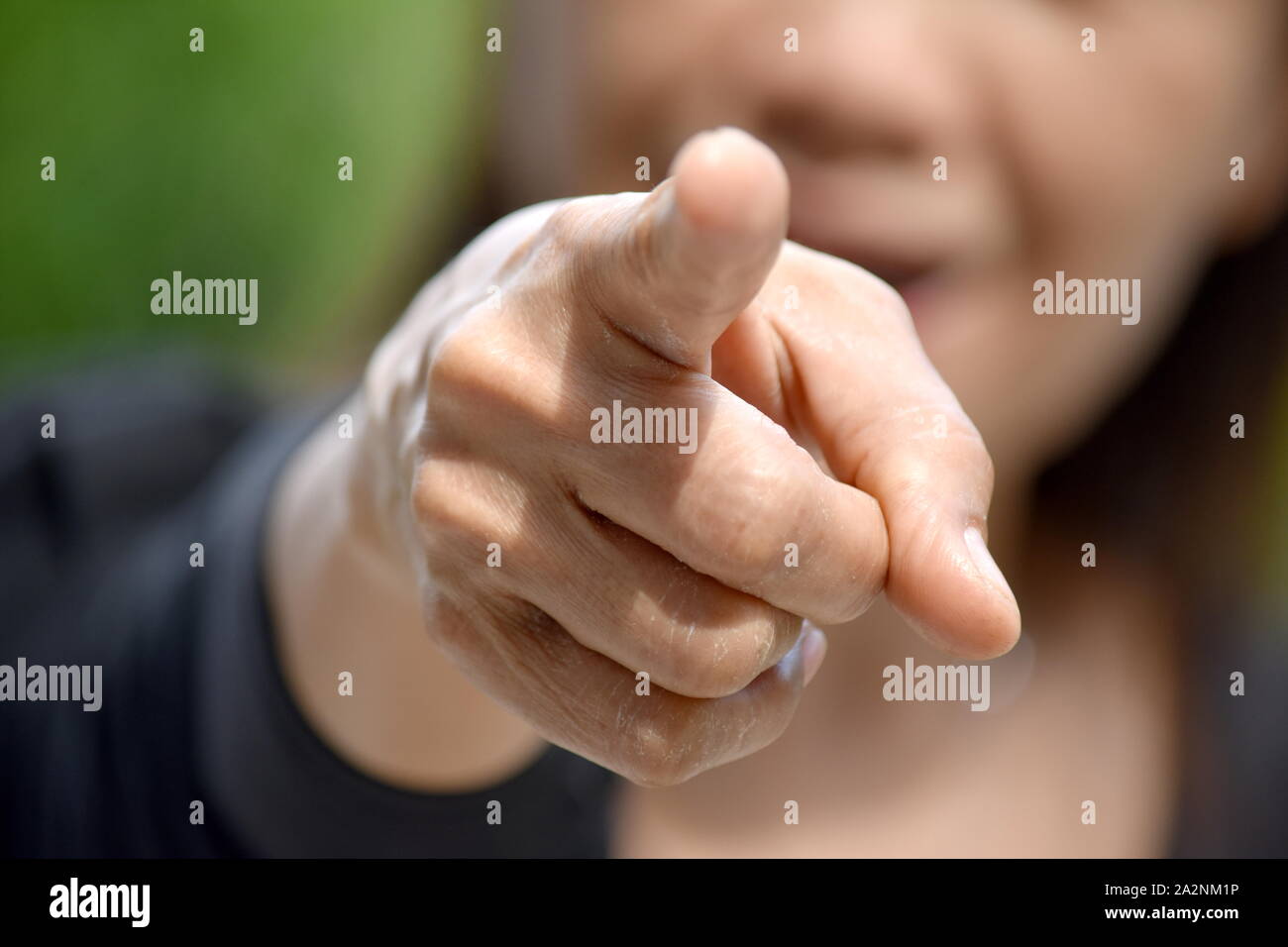 An Older Female Senior Pointing Stock Photo - Alamy