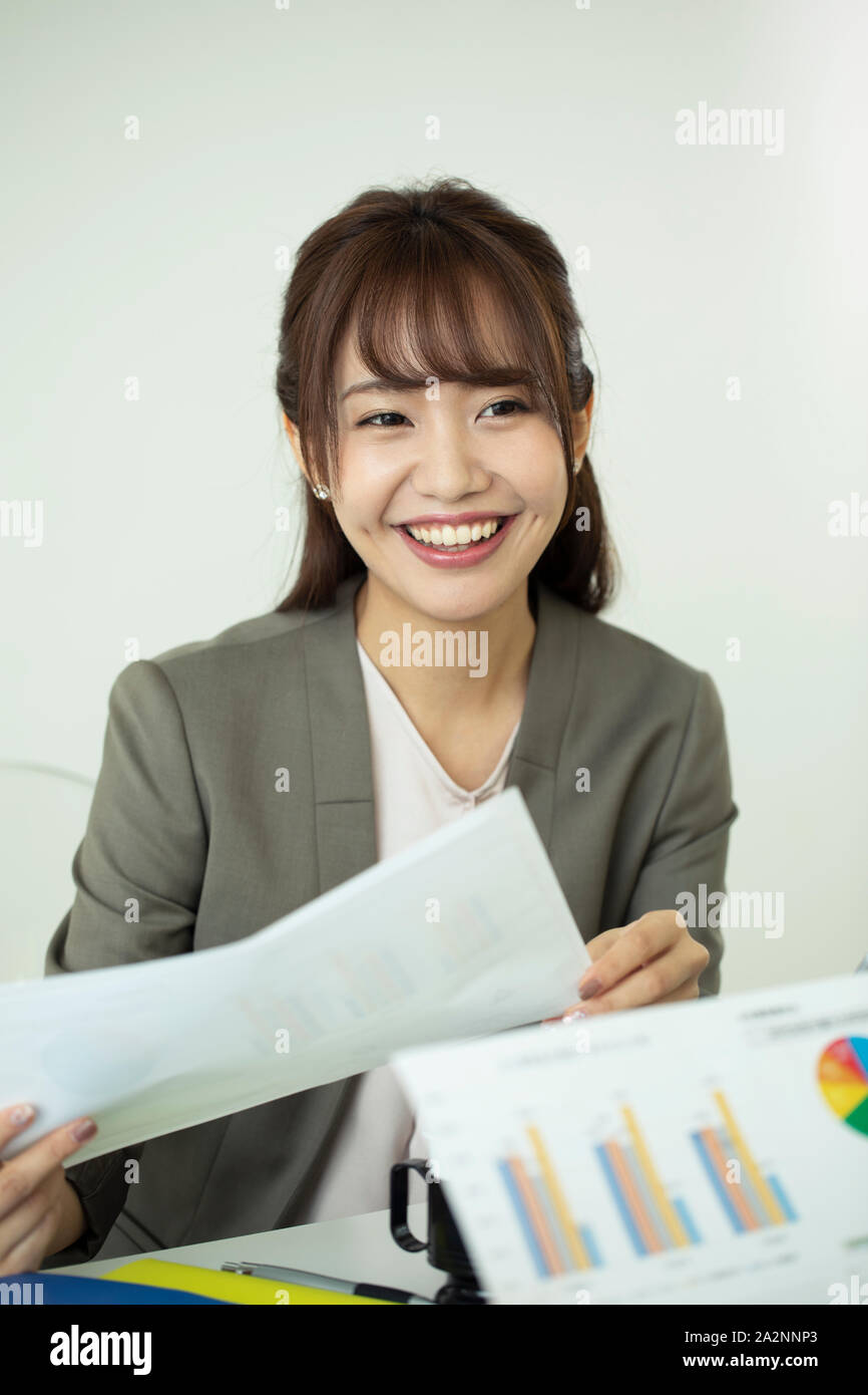 Japanese businesswoman in the office Stock Photo - Alamy