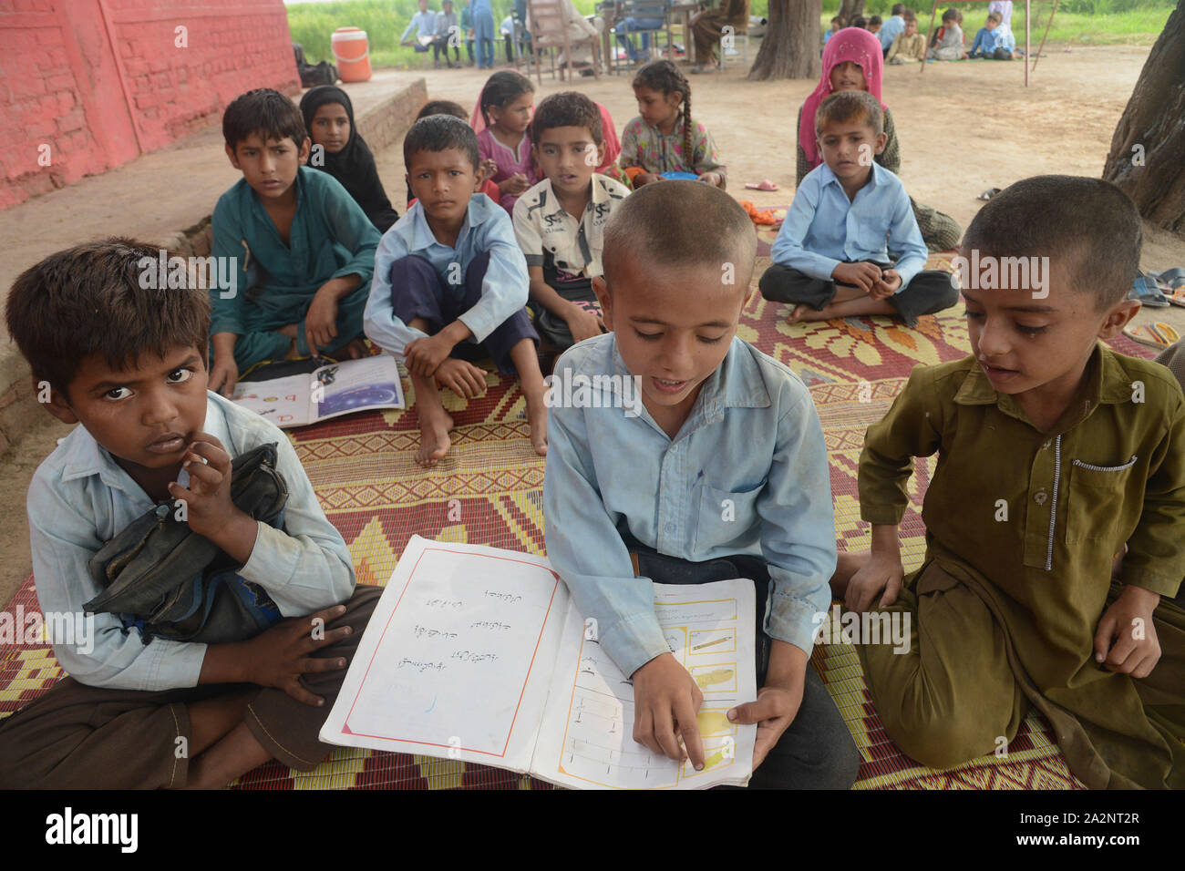 Pakistani teachers teach students at Government Primary School Mozia ...