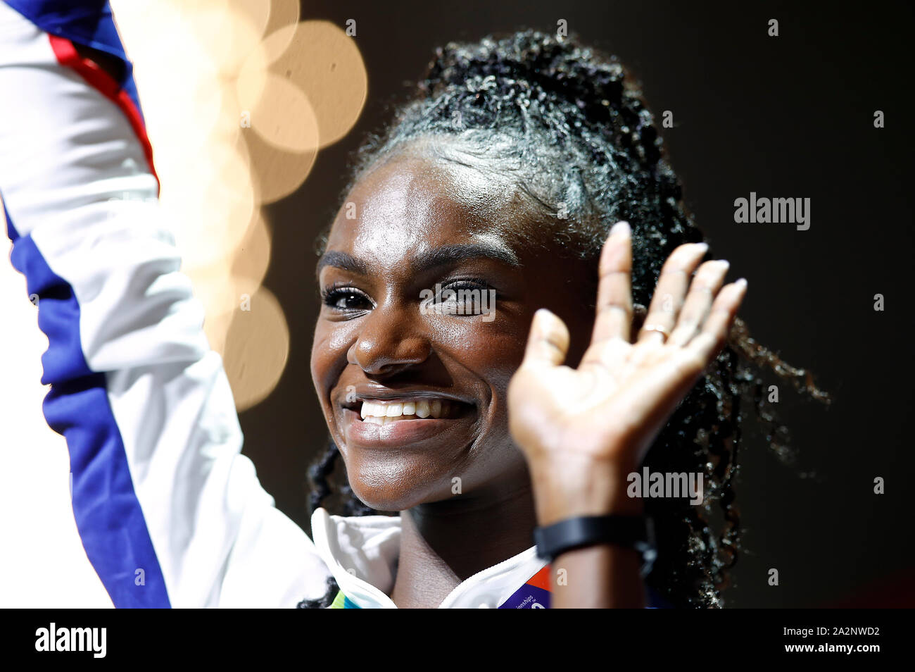 Great Britain's Dina Asher-Smith receives her gold medal for the Women ...