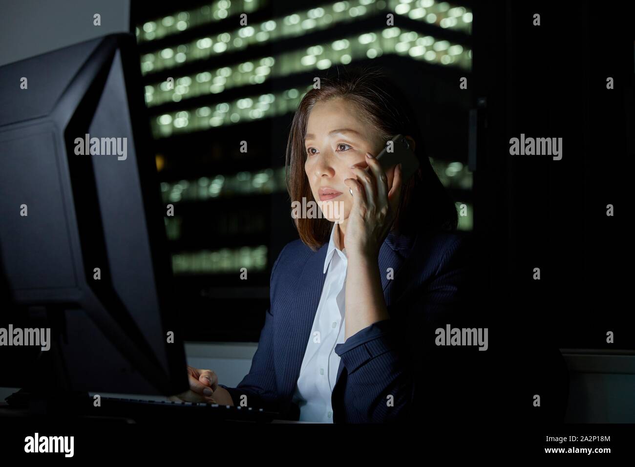 Japan working office night hi-res stock photography and images - Alamy