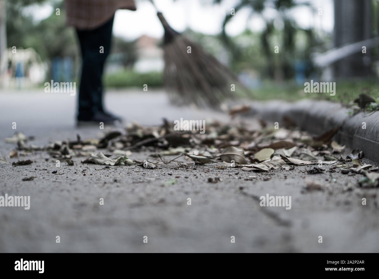 Scavenger sweeper in street in hi-res stock photography and images - Alamy