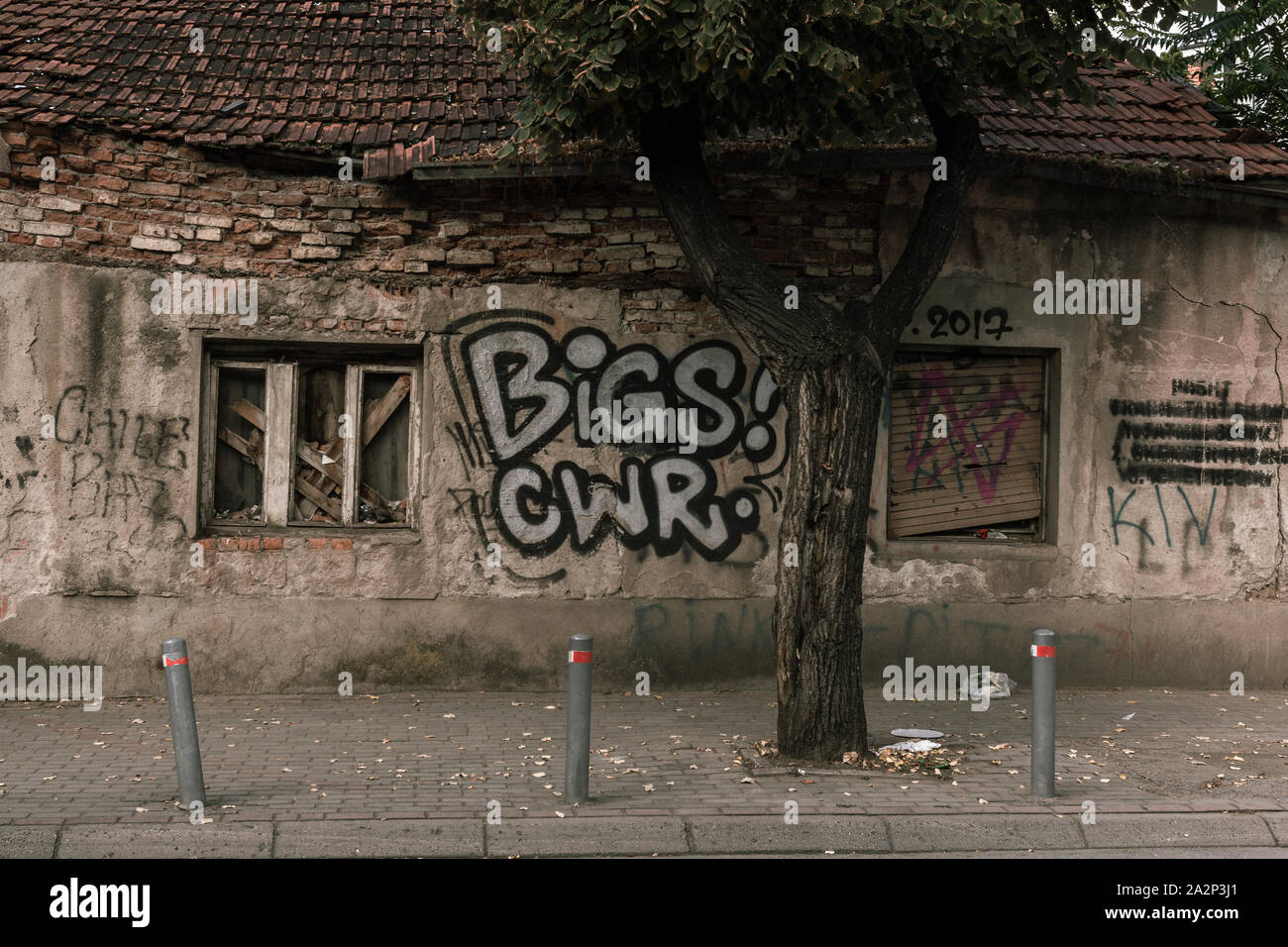 Graffiti drawing on old building in Pristina . Kosovo Stock Photo - Alamy