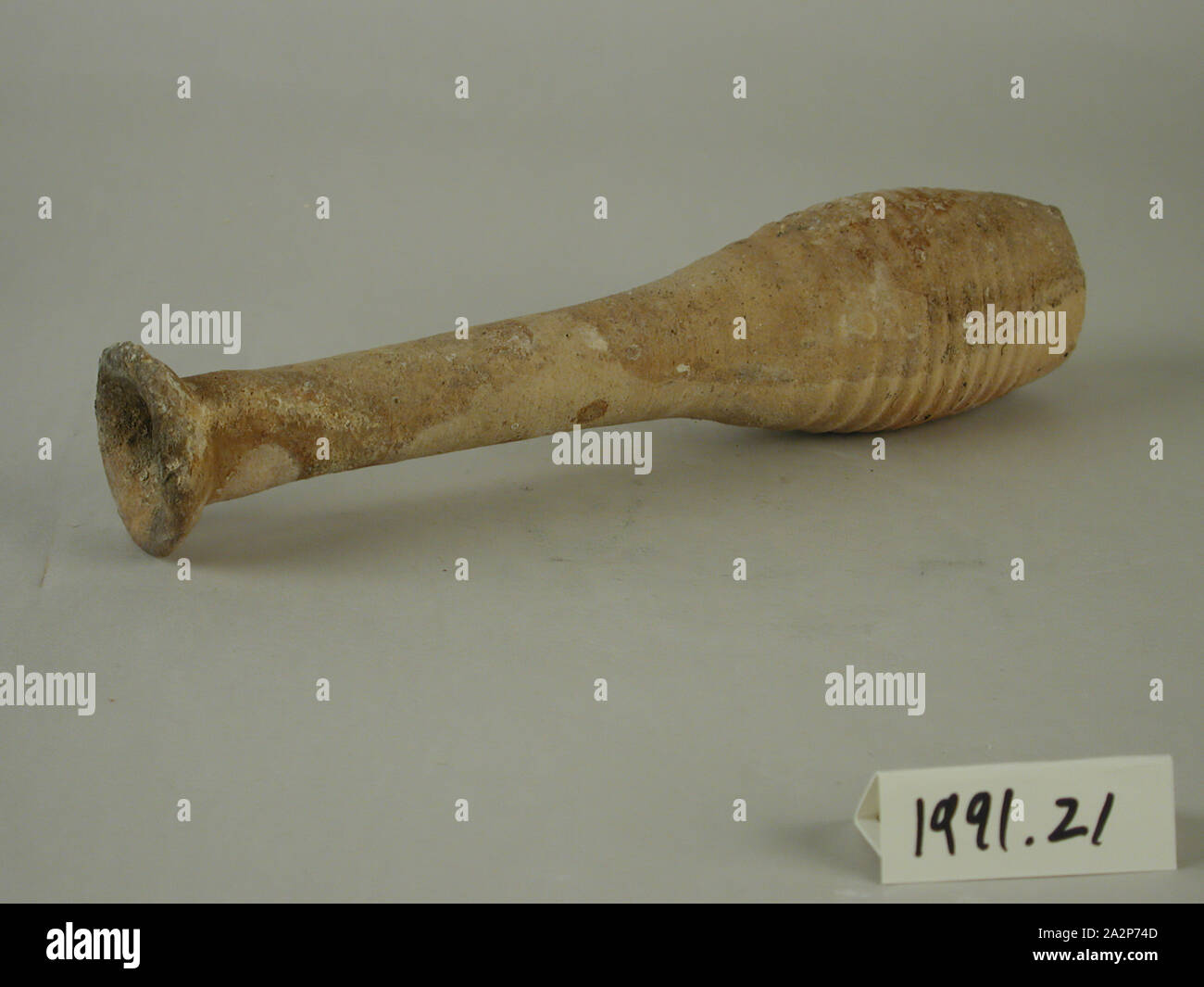 Crude buff ware tall bottle hi-res stock photography and images - Alamy