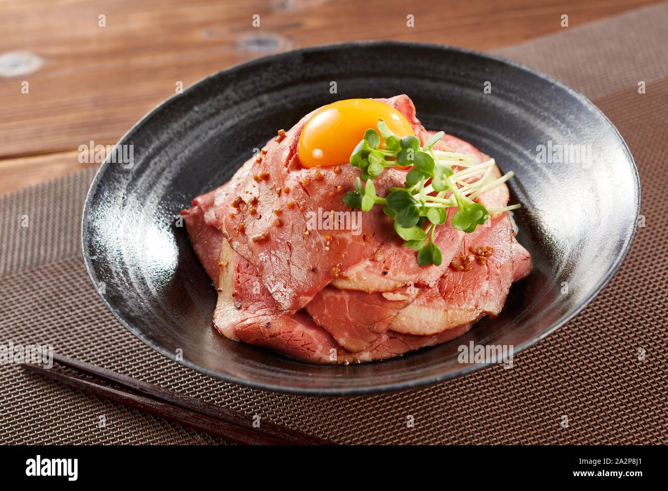 Roast beef rice bowl Stock Photo - Alamy