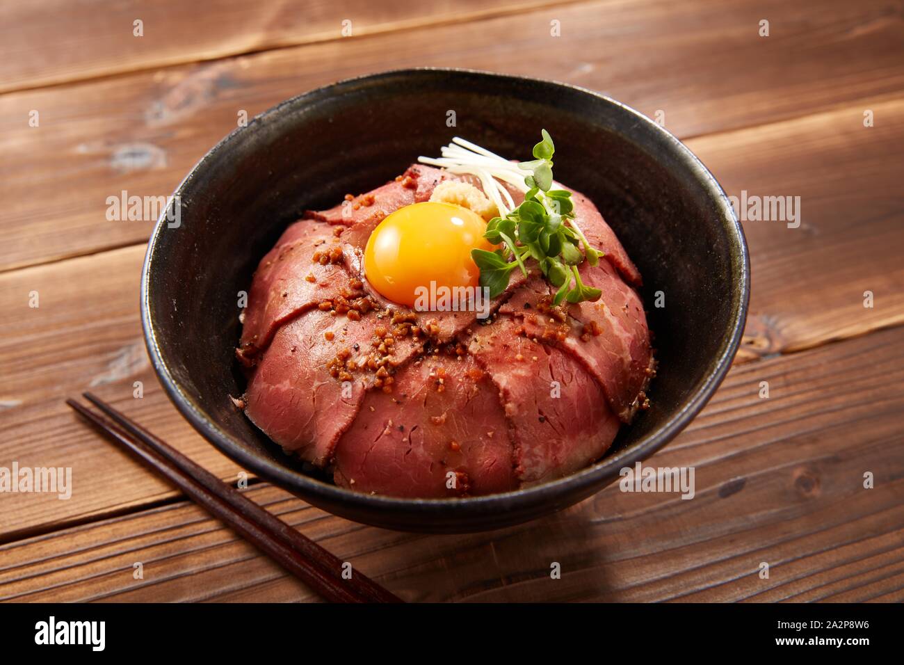 Roast beef rice bowl Stock Photo - Alamy