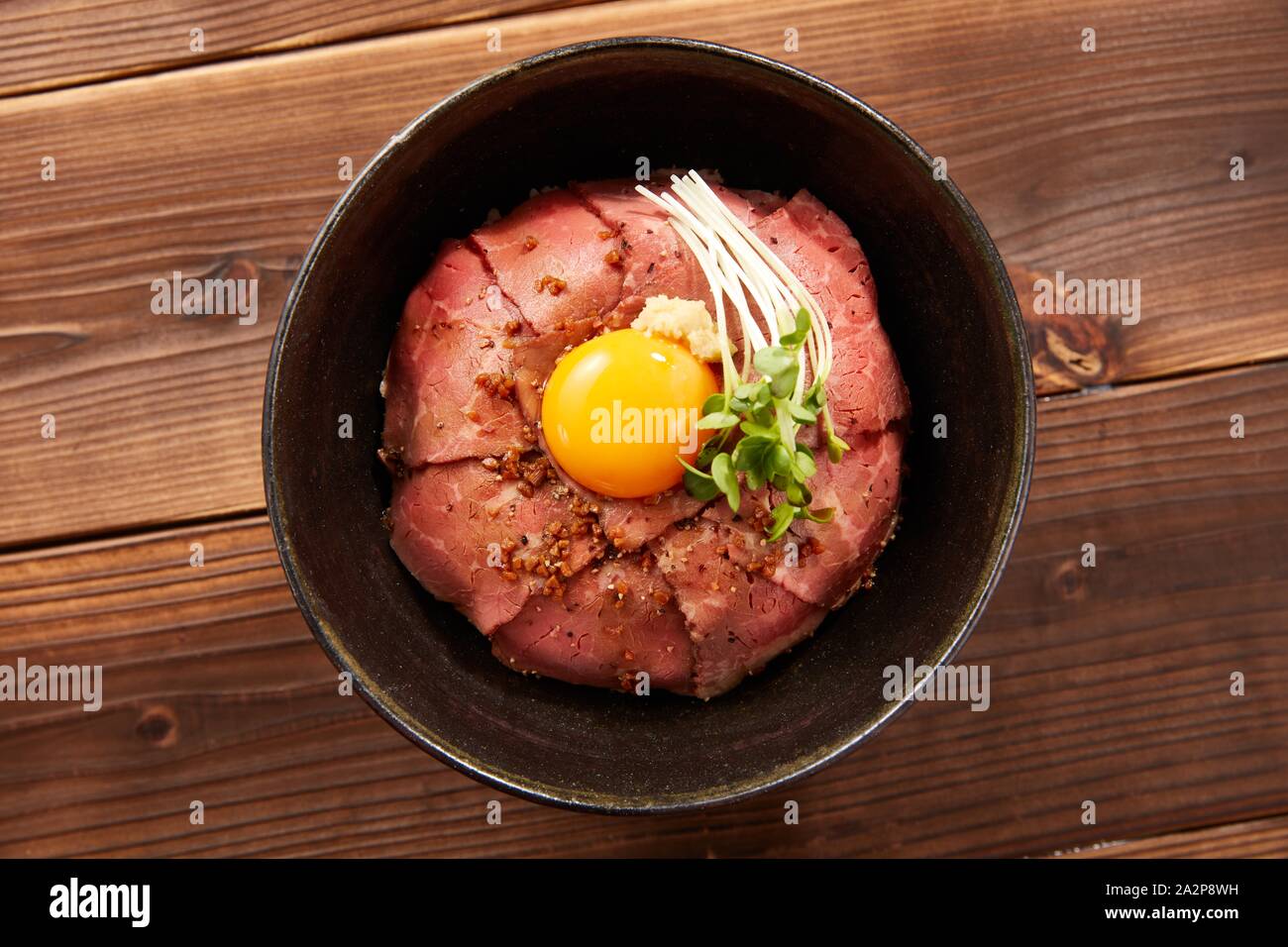 Roast beef rice bowl Stock Photo - Alamy
