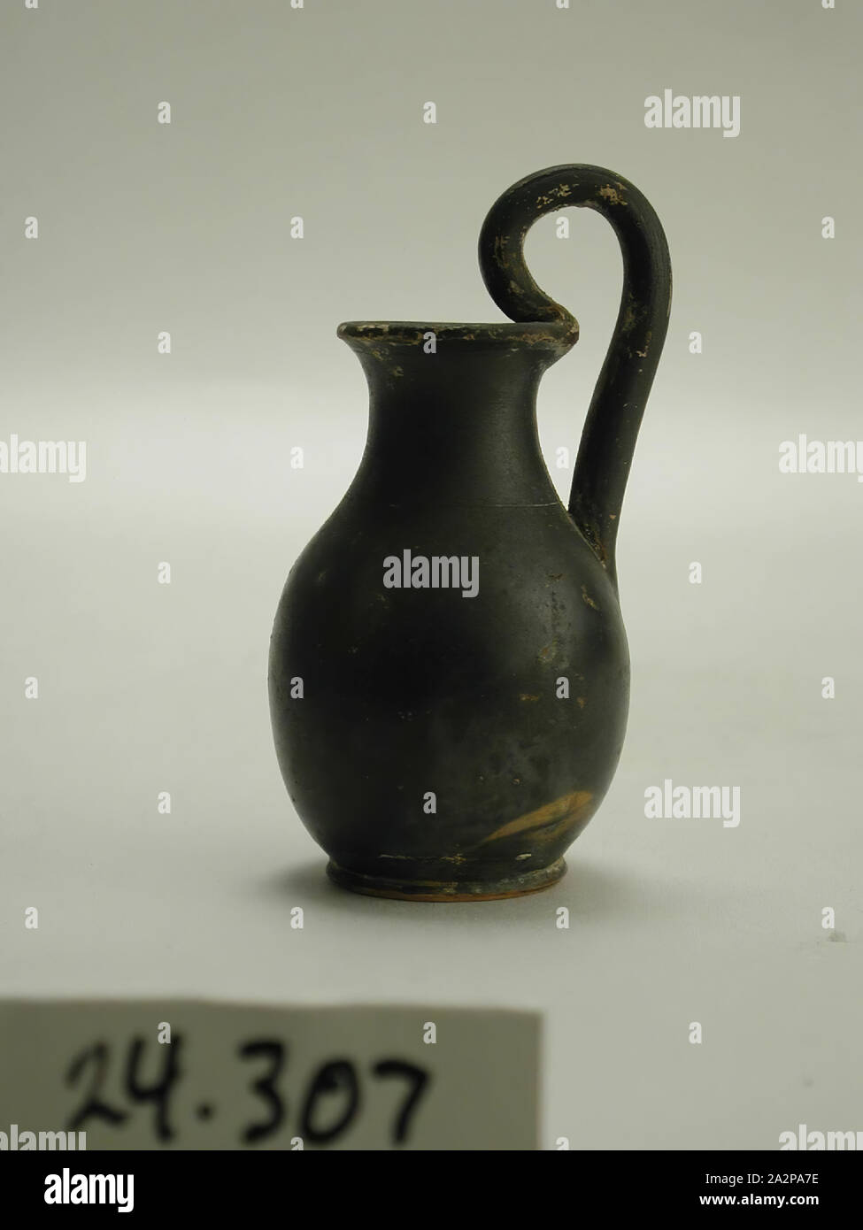 Greek, Olpe, late 6th Century BC, glazed earthenware, 4 x 2 1/4 x 2 in ...