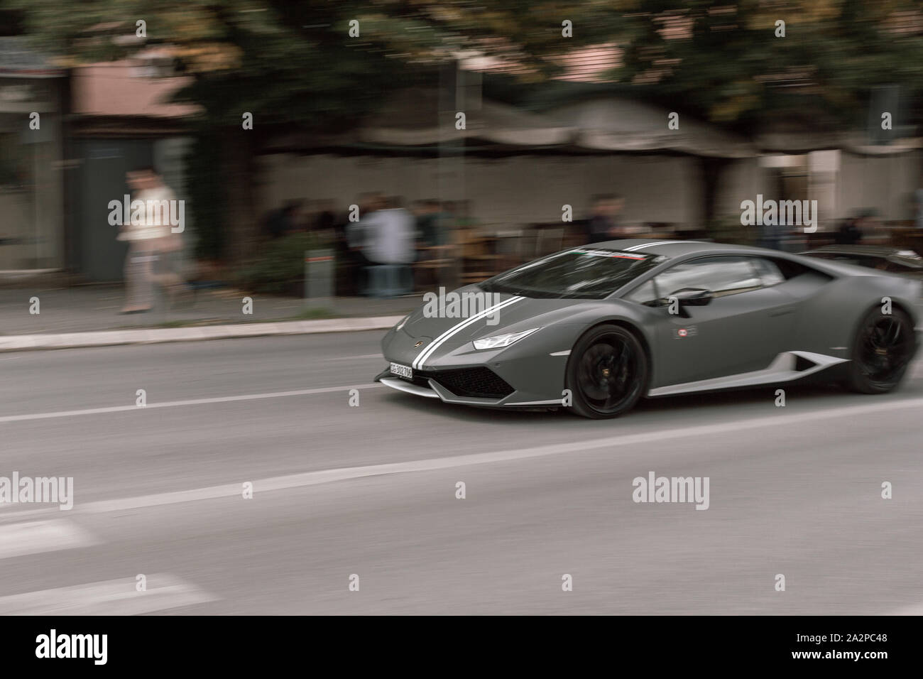 Fancy car Ferrari on Pristina streets Stock Photo - Alamy