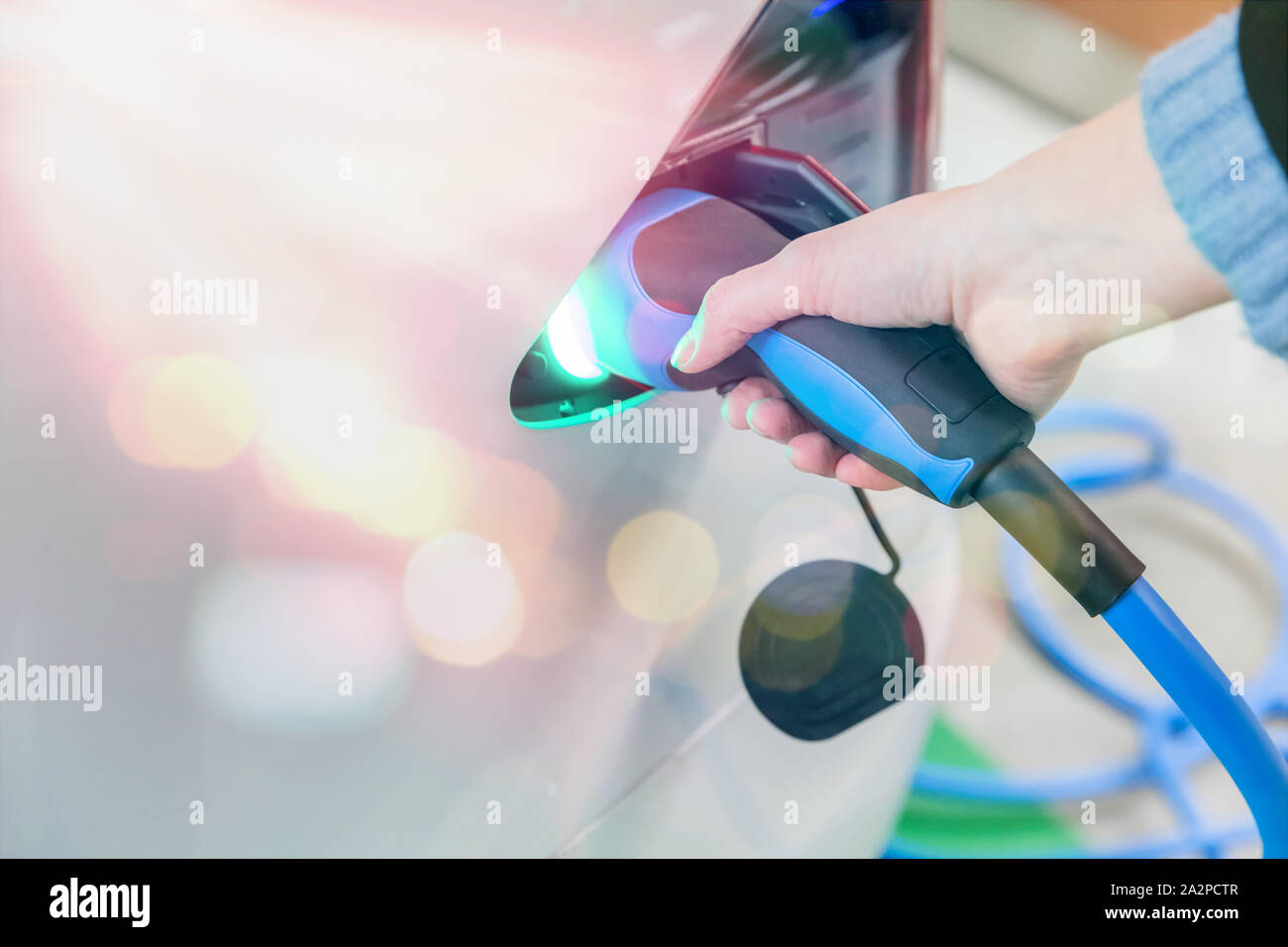 Loading a electric car hi-res stock photography and images - Alamy