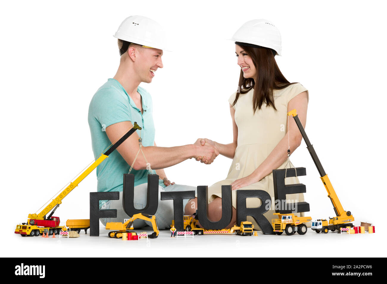 Joyful man and woman building up their future Stock Photo - Alamy