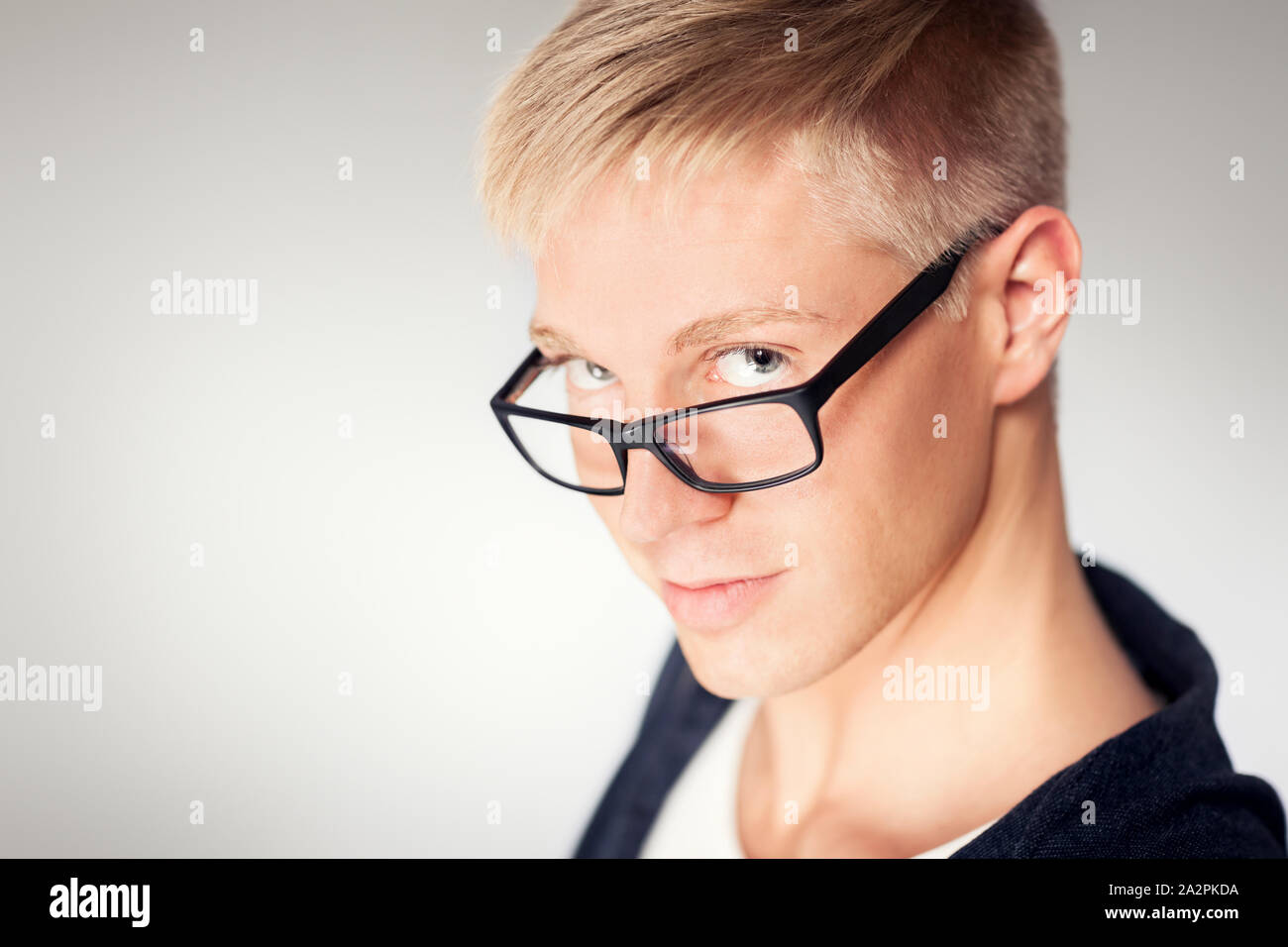 Young blond handsome man glasses hi-res stock photography and images ...