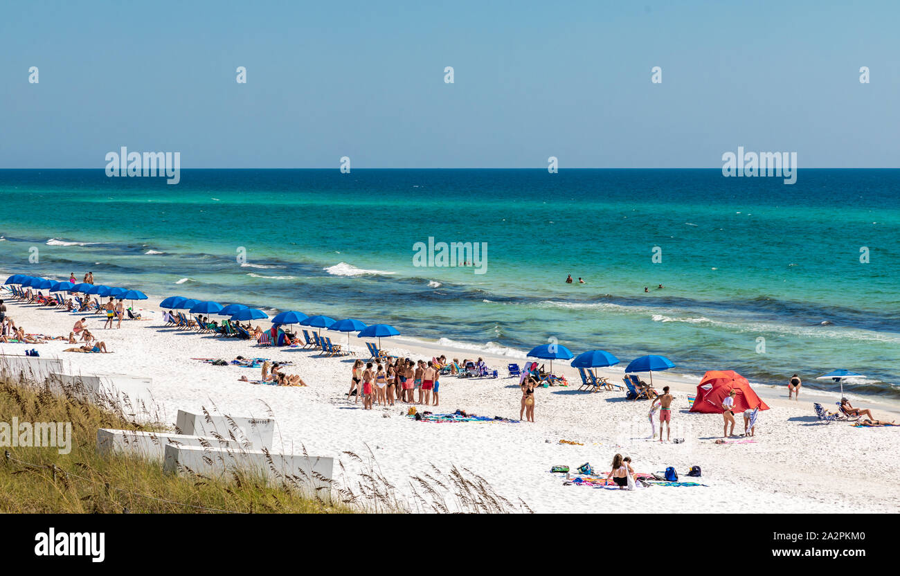 People on the white sand beach in Seaside, FL Stock Photo - Alamy