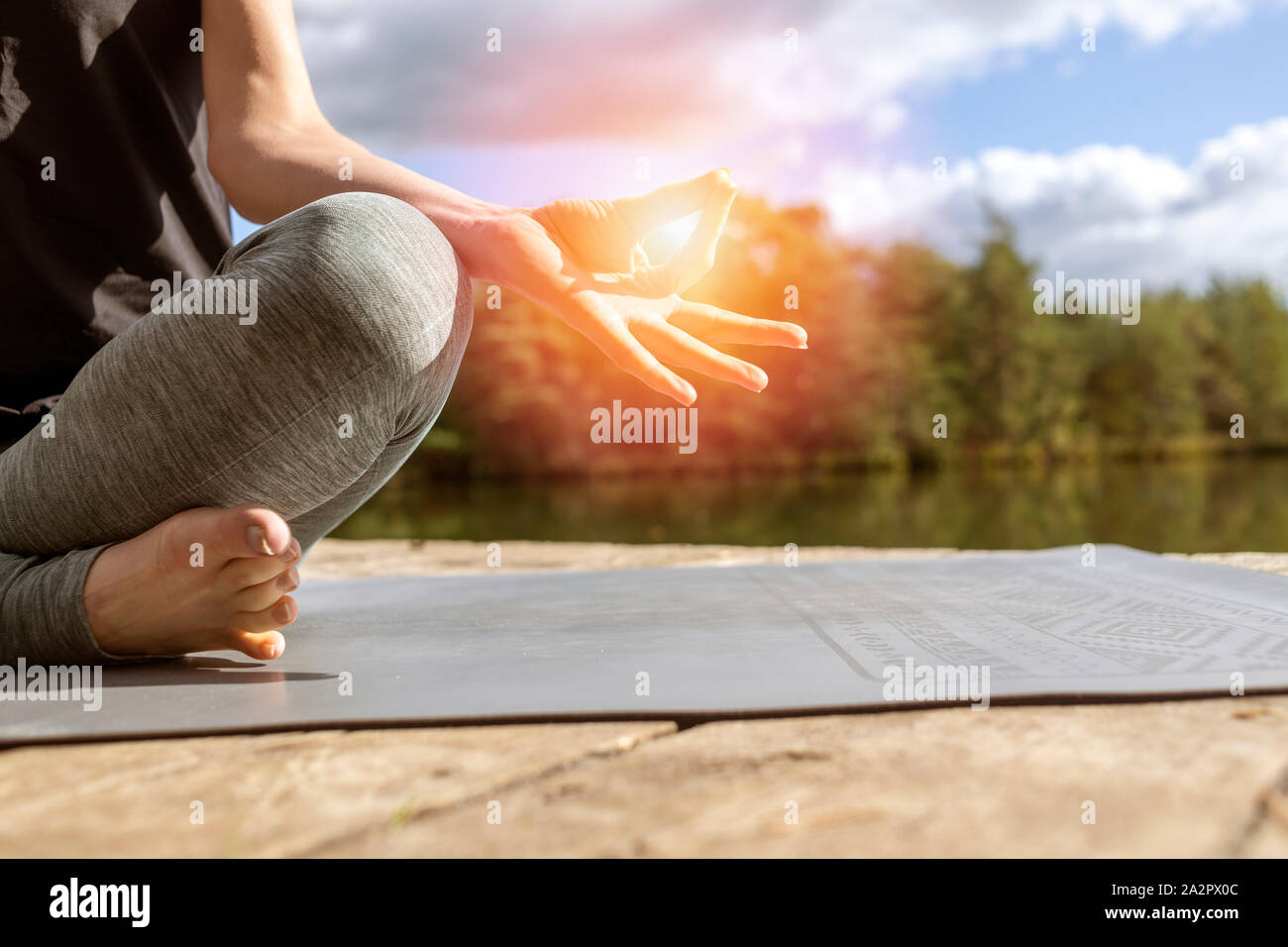 Woman yoga hand pose outside hi-res stock photography and images - Alamy