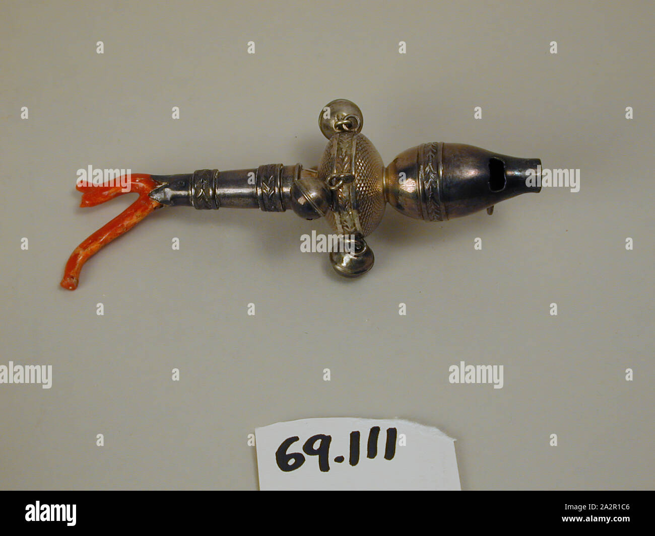 Silver baby rattle hi-res stock photography and images - Alamy