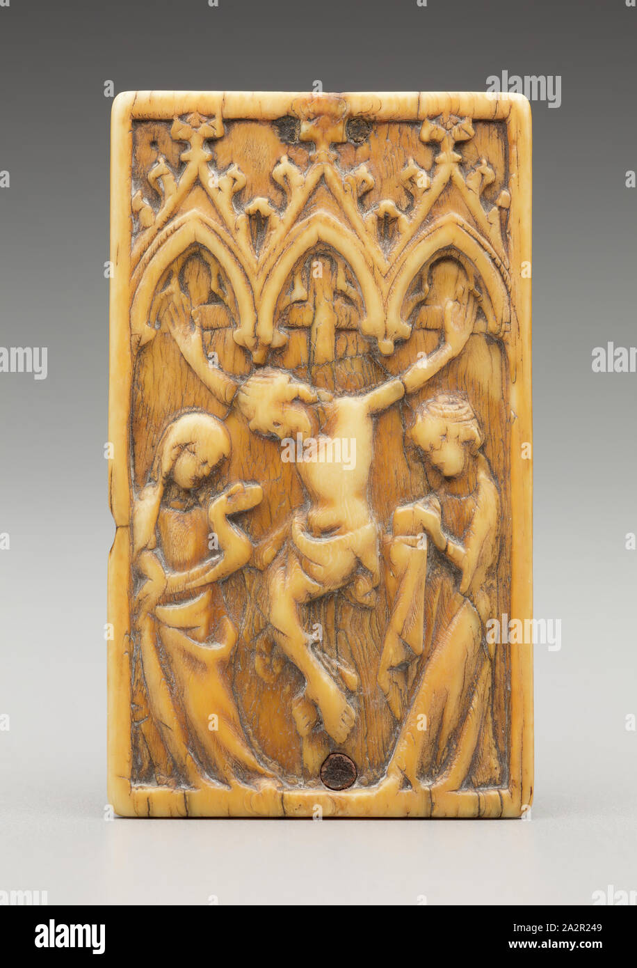 Unknown (French), Crucifixion, 14th Century, ivory, Height x width: 3 1/2 x 2 in Stock Photo - Alamy