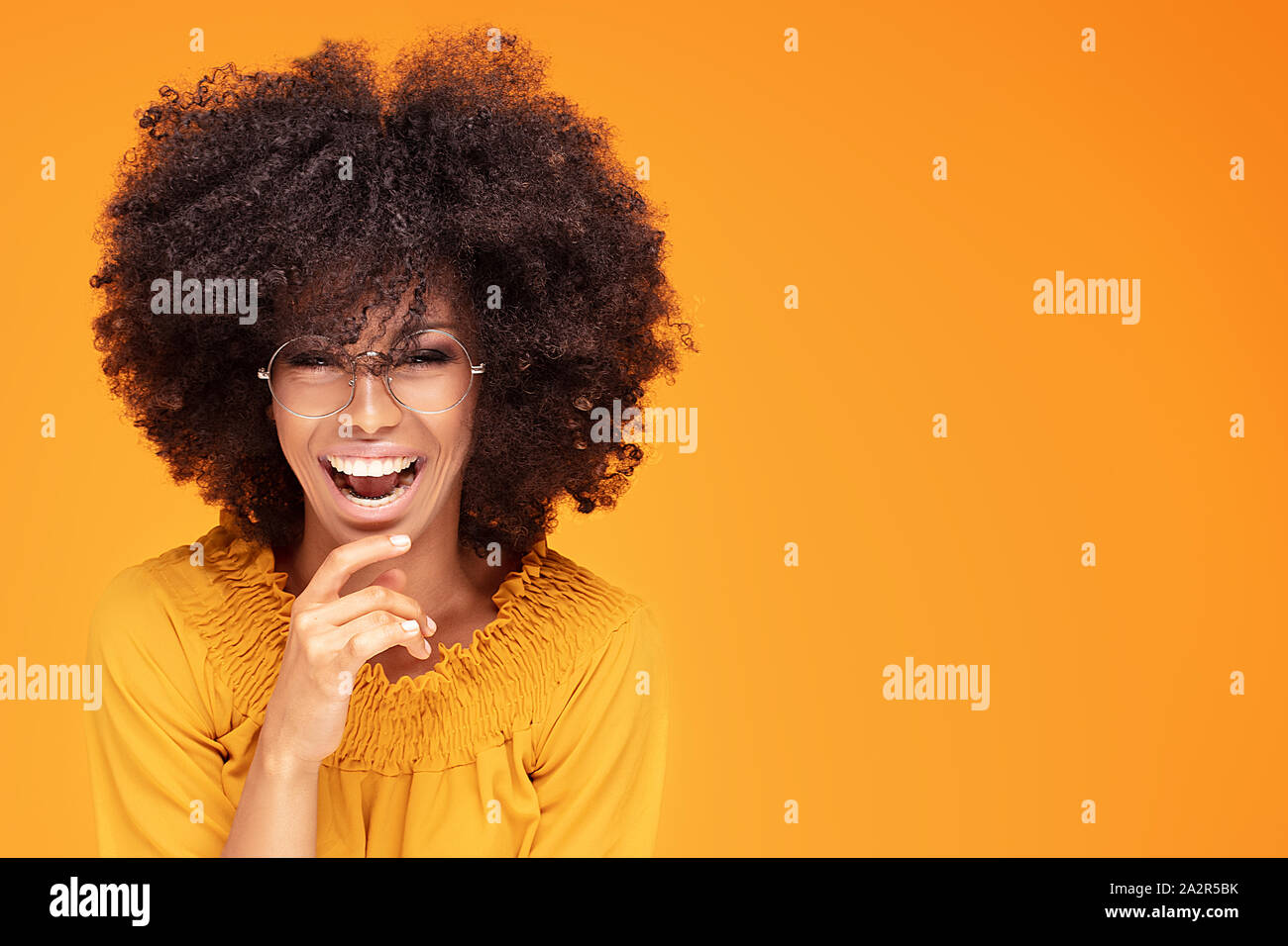 Happy afro hi-res stock photography and images - Alamy