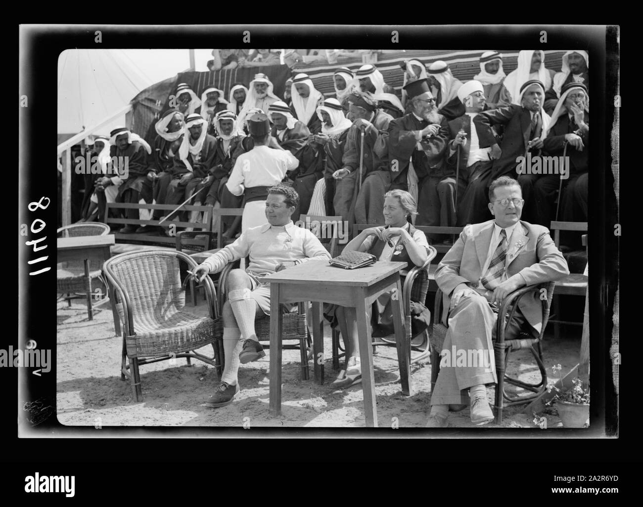 Race meeting (horse & camel). Beersheba. Crowds around the grand stand ...