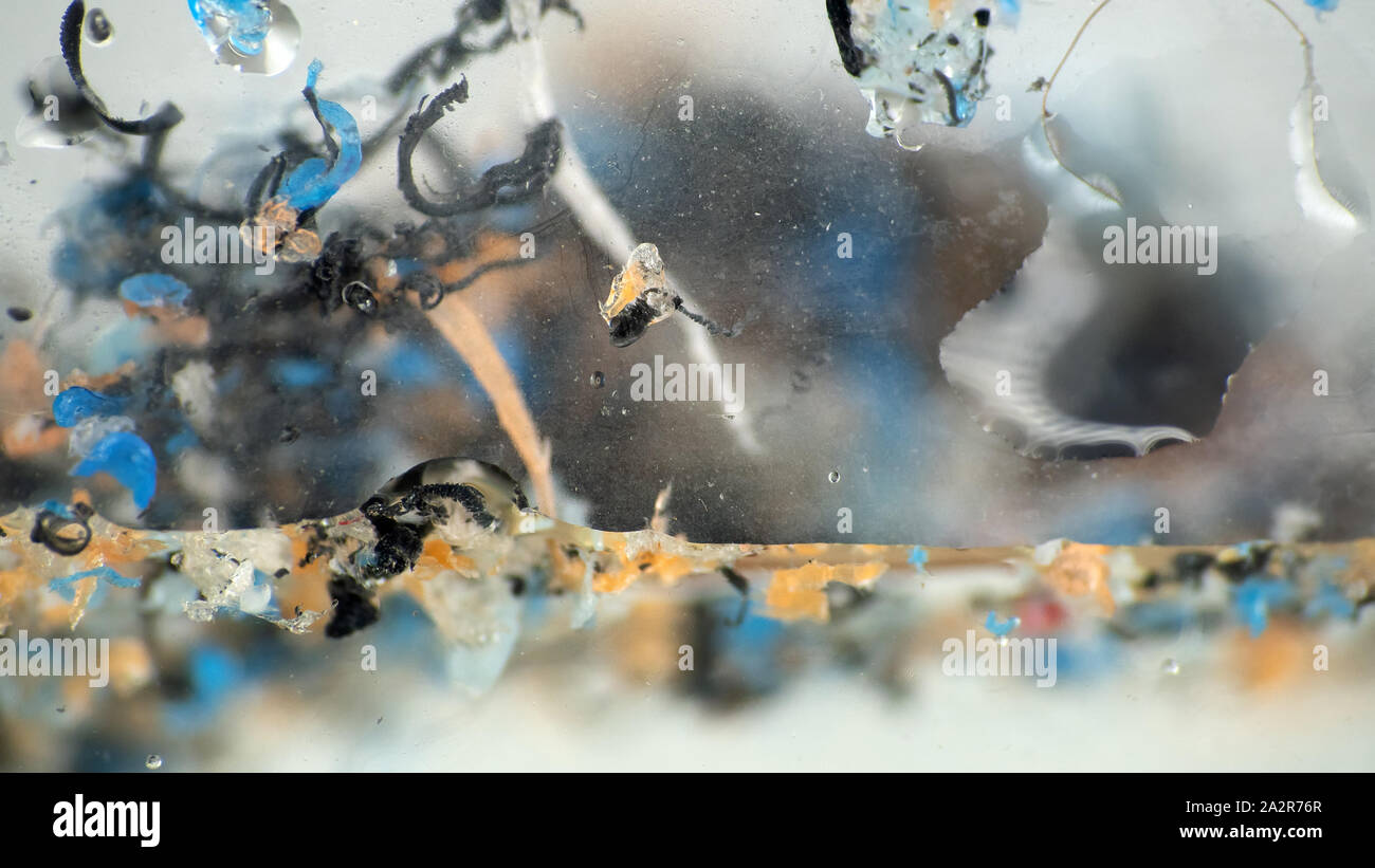 Plastic gets into water basin and gradually destroyed by waves and sun ...