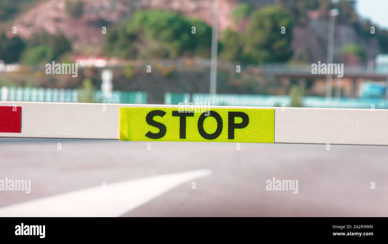 Paid highways in India. Terminal fare, toll road. Barrier with a ...