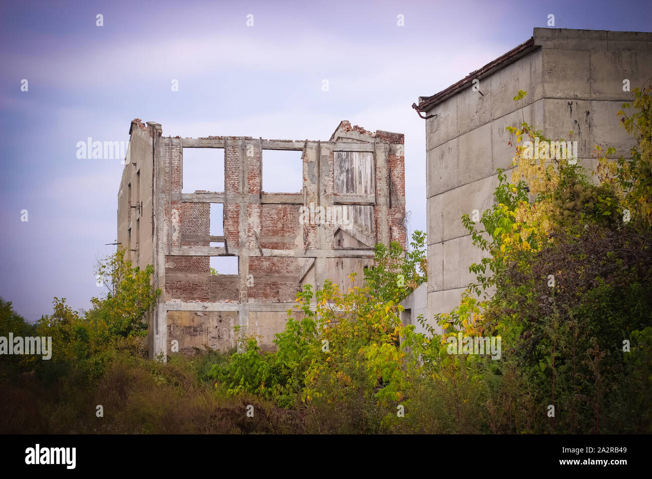Destroyed industrial building after demolition Stock Photo - Alamy